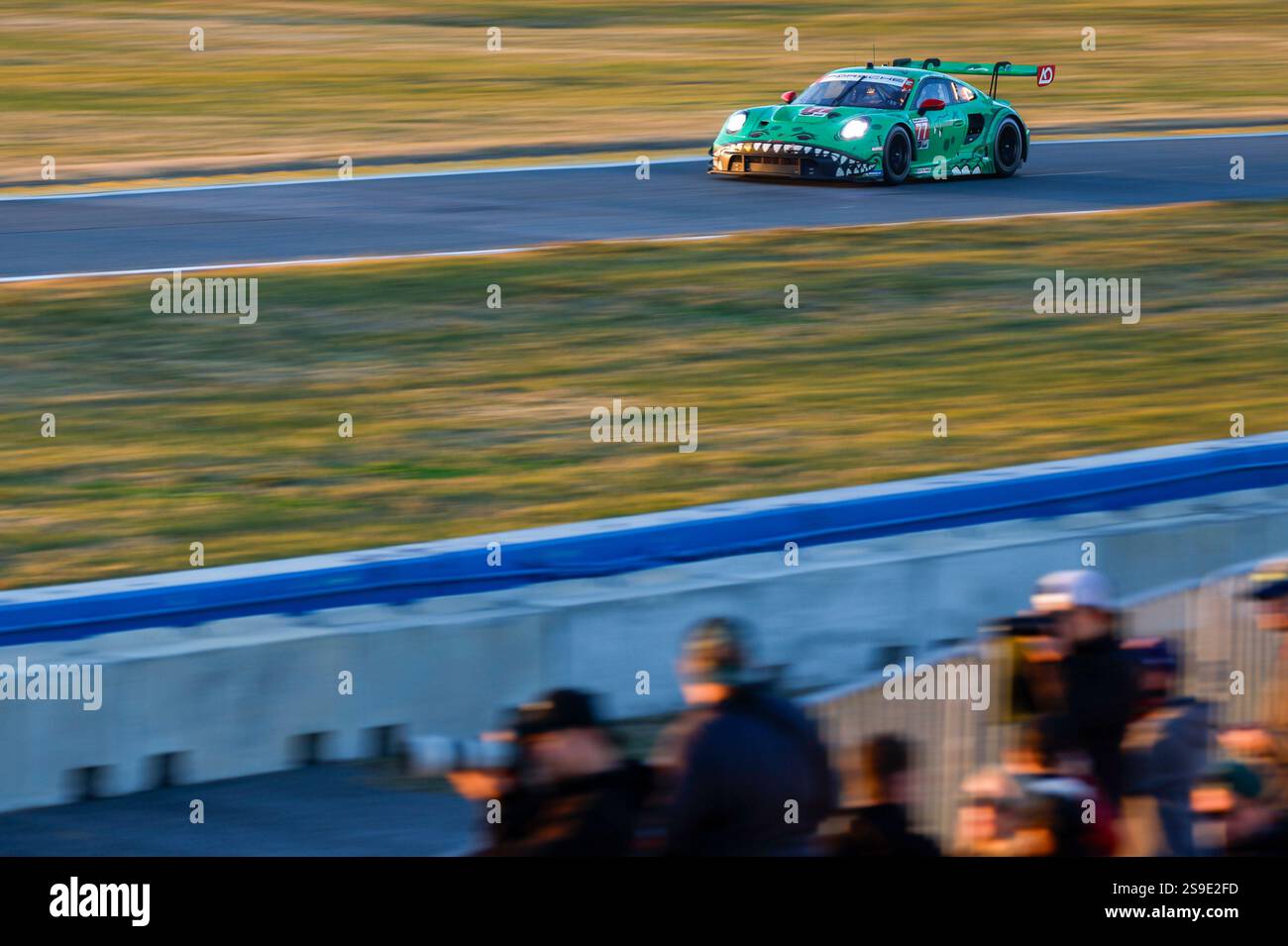 DAYTONA BEACH, FL - JANUARY 25: The #77 AO Racing Porsche 911 GT3 R ...