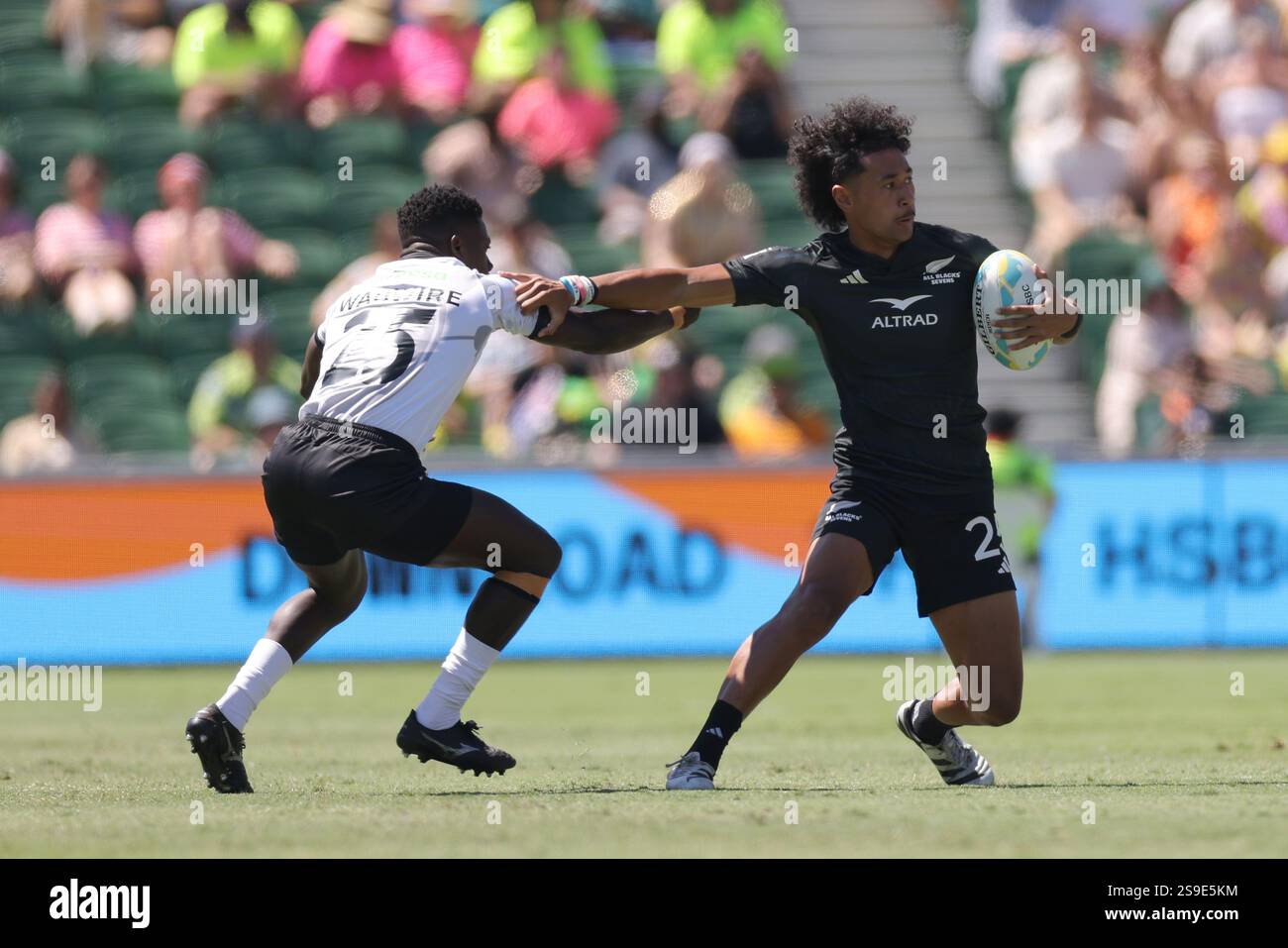 Perth, Australia. 26th Jan, 2025. Cody Vai of New Zealand is tackled by ...