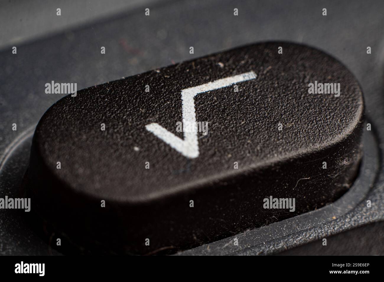 Keypad button showing square root symbol on modern electronic ...