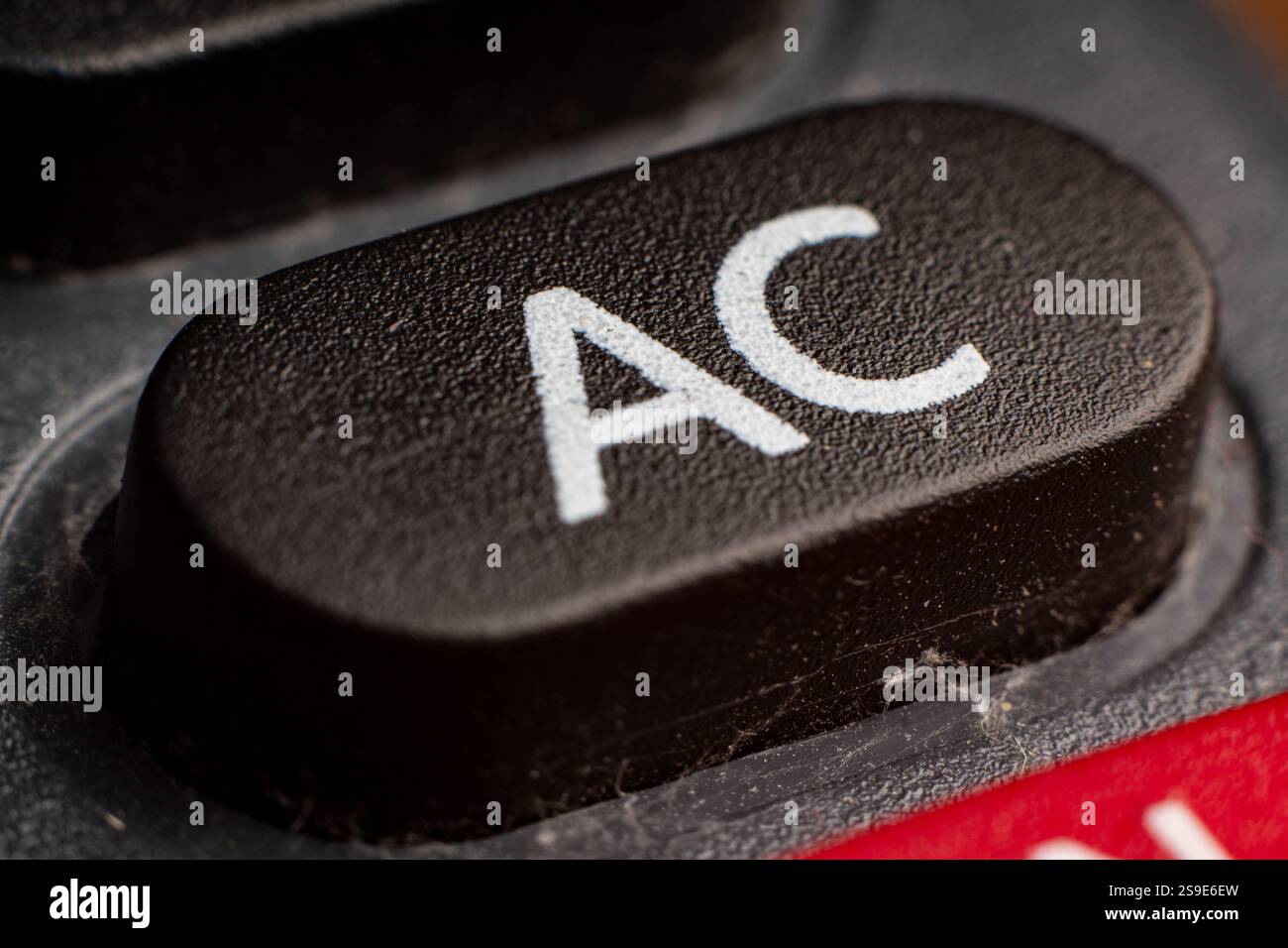 Closeup of a black electronic keypad button for calculating financial ...