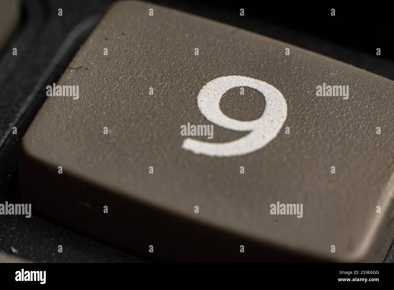 Closeup of a digital keypad showcasing the number nine in a modern ...