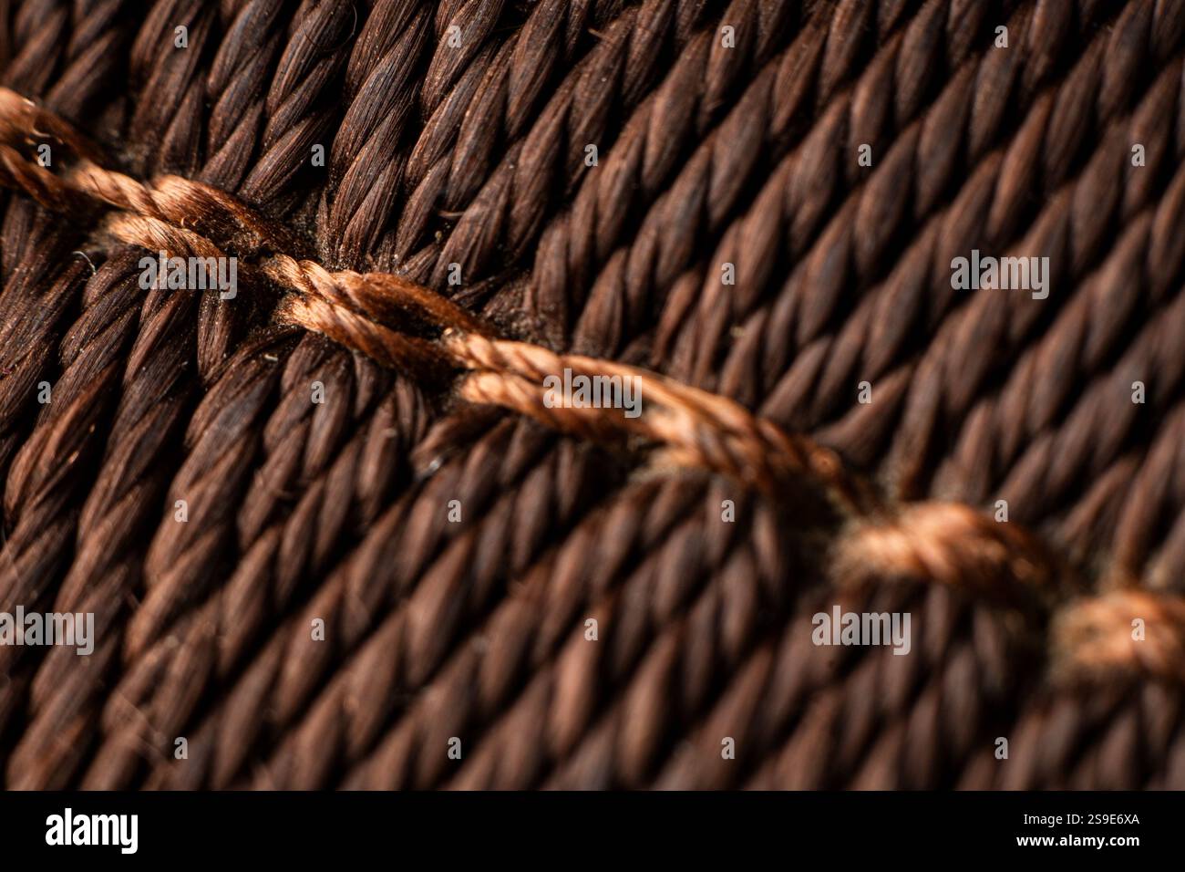 Detailed view of textured brown fabric showcasing intricate weaving ...