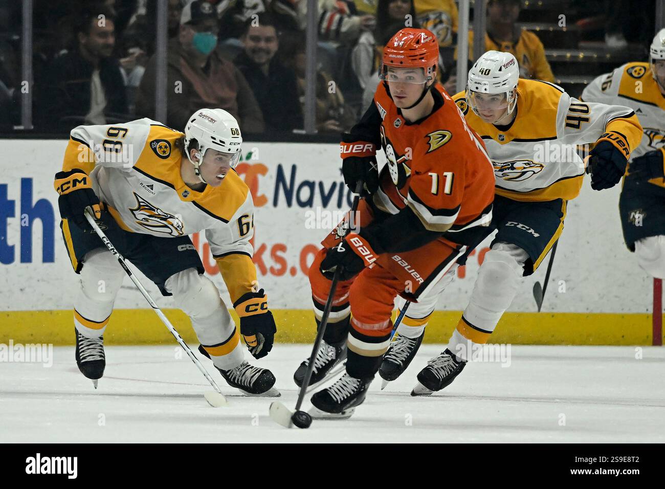 Anaheim Ducks center Trevor Zegras (11) controls the puck passed ...
