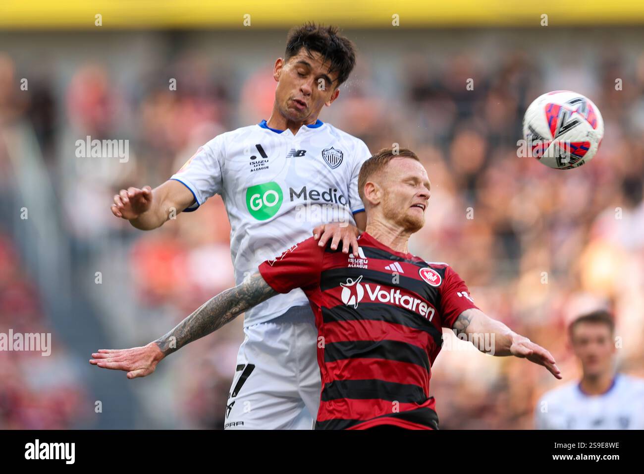 Logan Rogerson of Auckland and Jack Clisby of the Wanderers go up for a ...