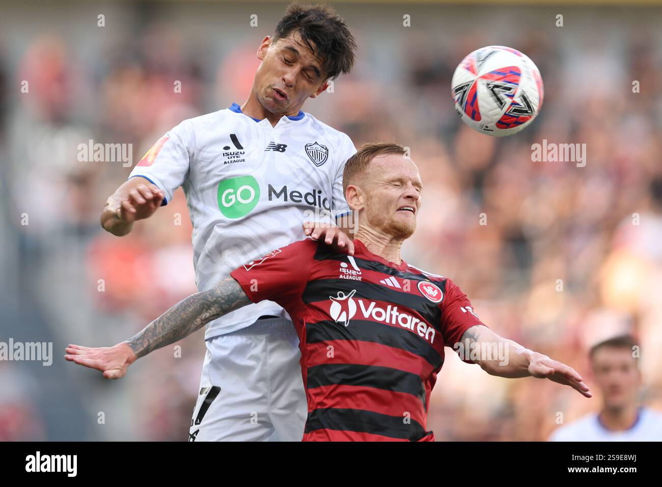 Logan Rogerson of Auckland and Jack Clisby of the Wanderers go up for a ...