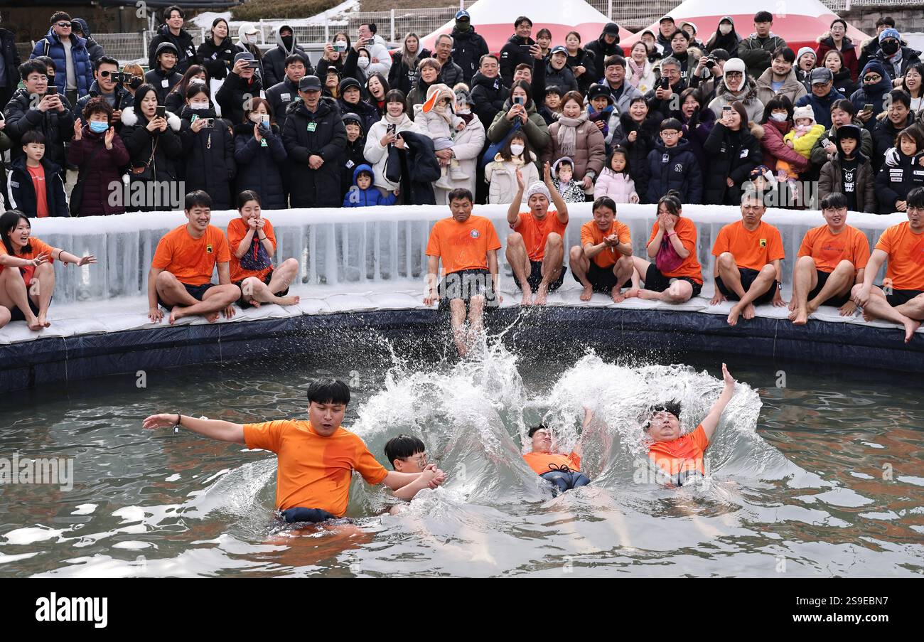 Hwacheon Sancheoneo Ice Festival in Hwacheon-gun Participants take an ...
