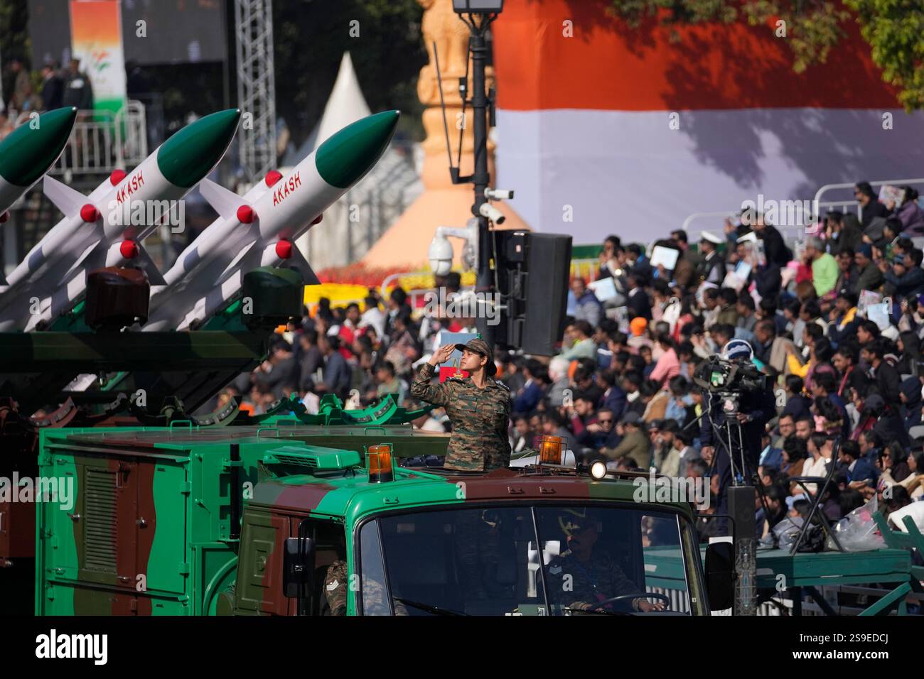 Indian defense forces march through the ceremonial Kartavya Path ...
