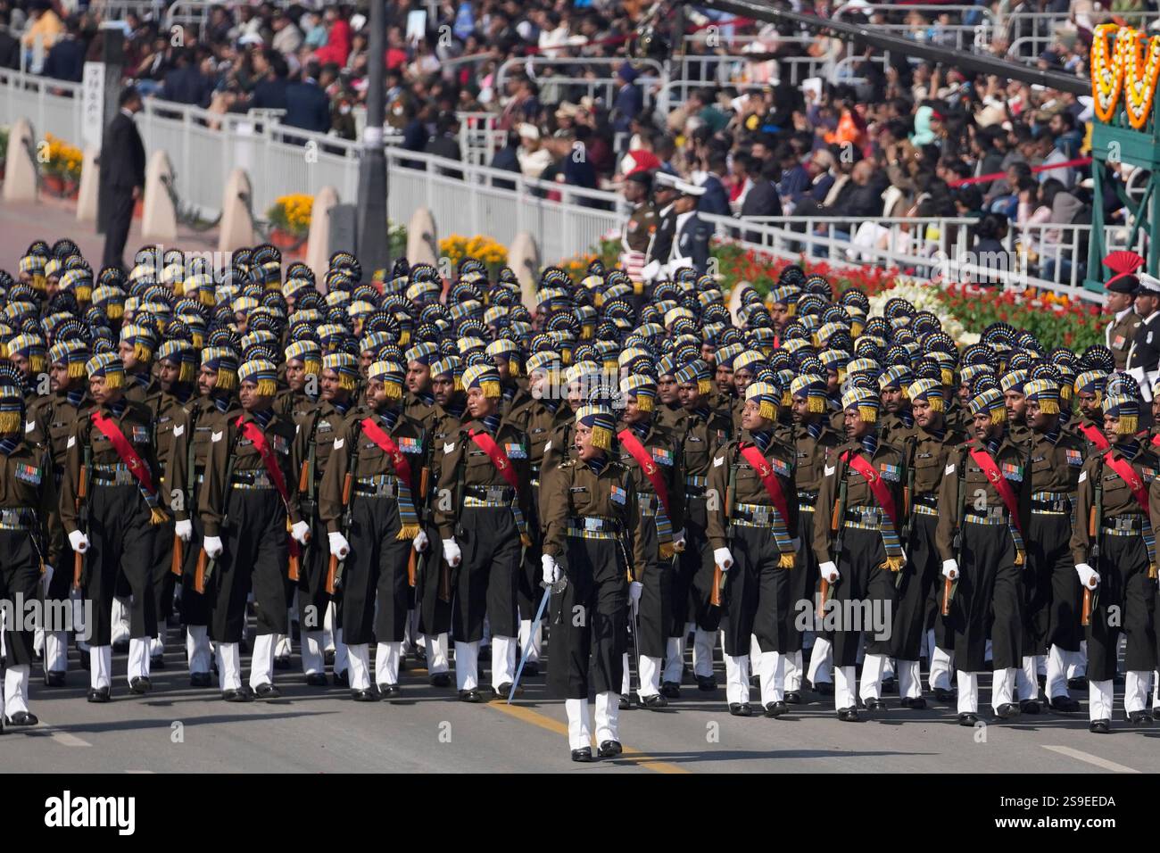 Indian defense forces march through the ceremonial Kartavya Path ...