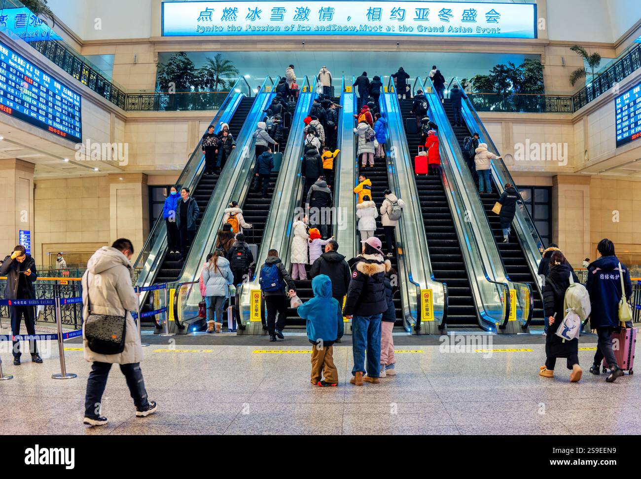 Passengers are seen at Harbin railway station in Harbin City, northeast ...