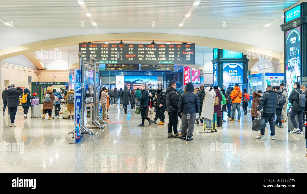 Passengers are seen at Harbin railway station in Harbin City, northeast ...