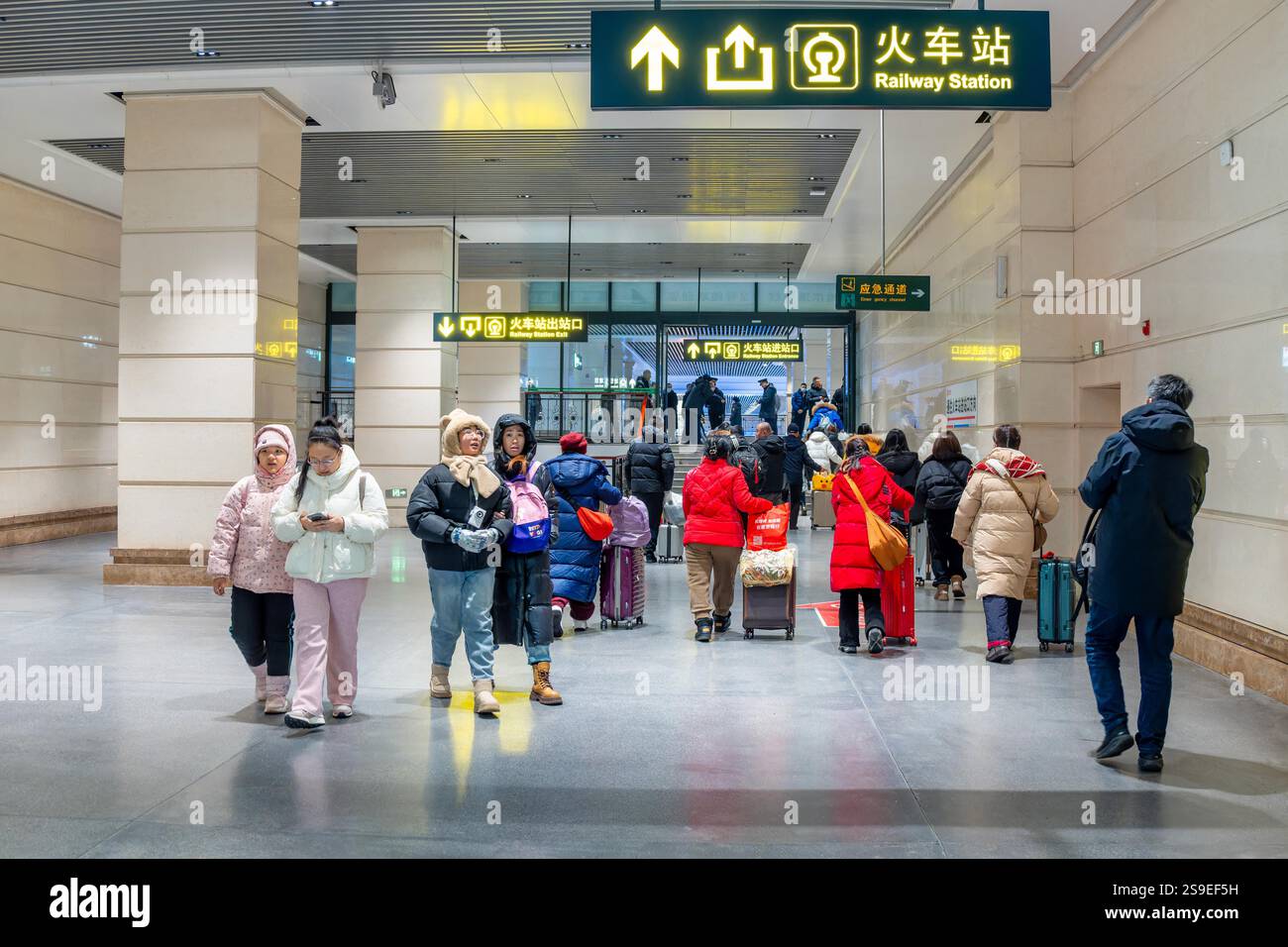 Passengers are seen at Harbin railway station in Harbin City, northeast ...
