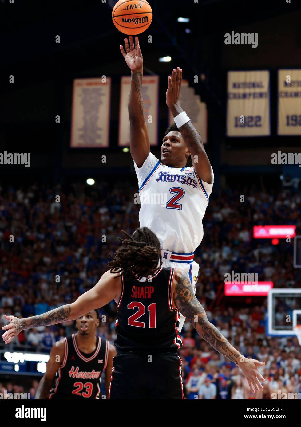 Kansas guard AJ Storr (2) hits a 3-point basket as Houston guard ...