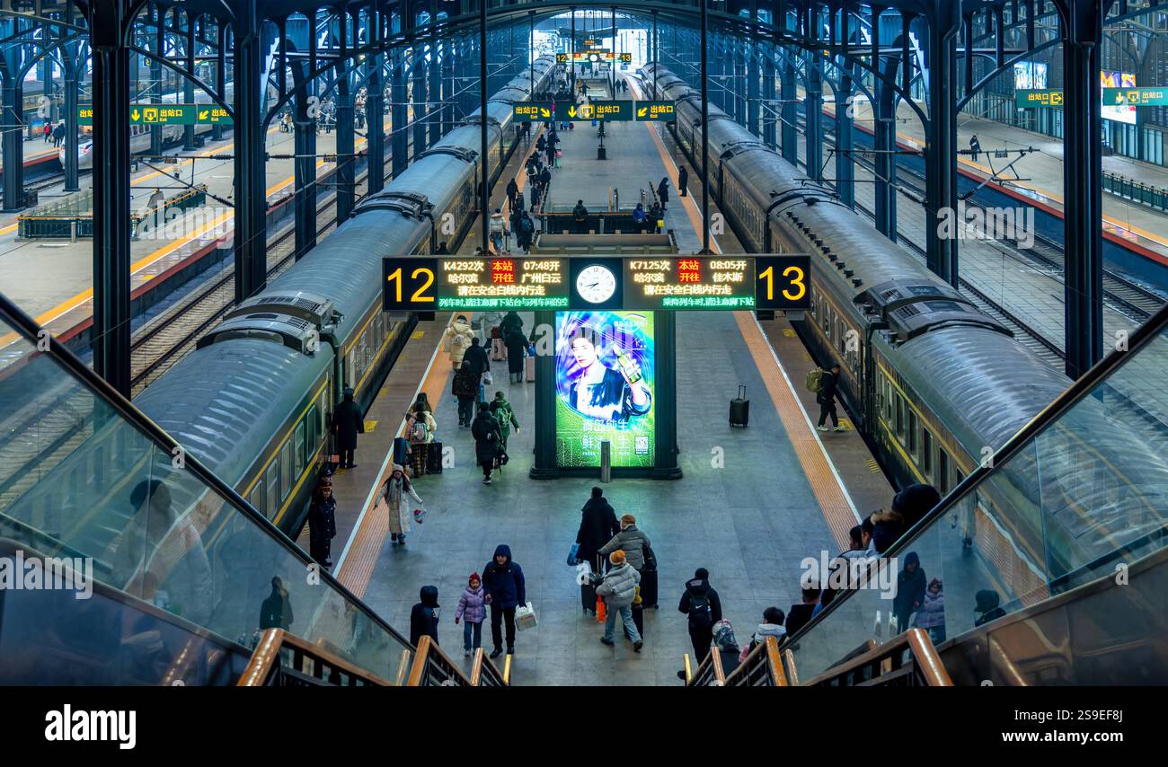 Passengers are seen at Harbin railway station in Harbin City, northeast ...