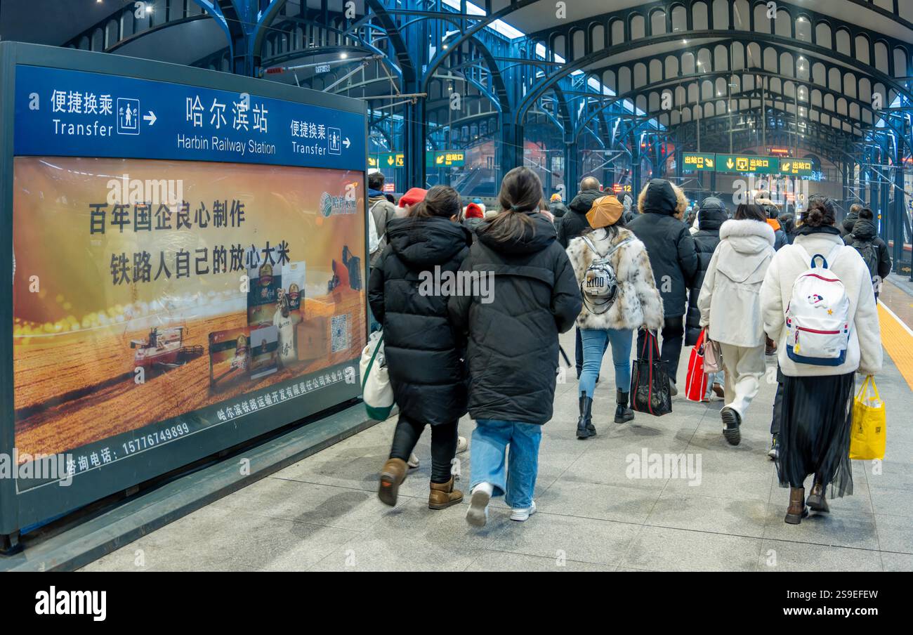 Passengers are seen at Harbin railway station in Harbin City, northeast ...