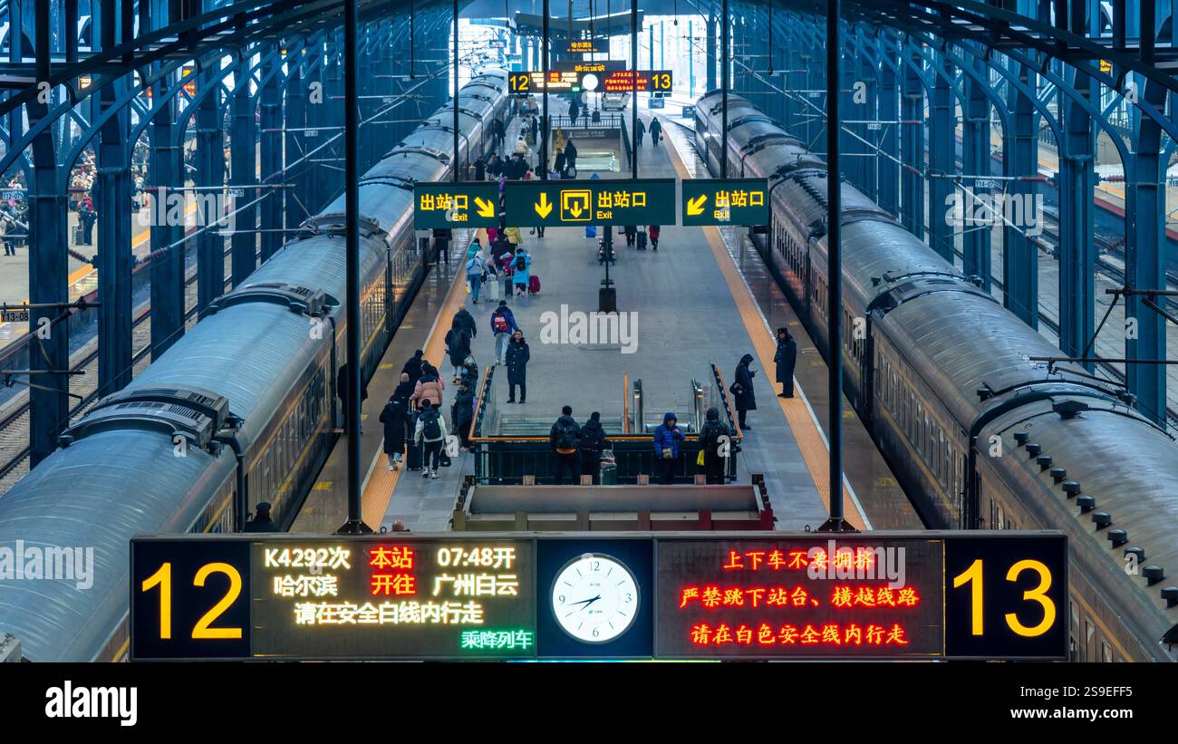 Passengers are seen at Harbin railway station in Harbin City, northeast ...