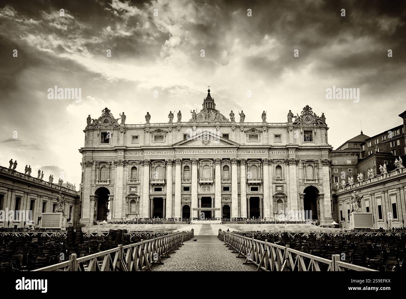 Dramatic sunset over facade of the basilica of St. Peter's in the ...