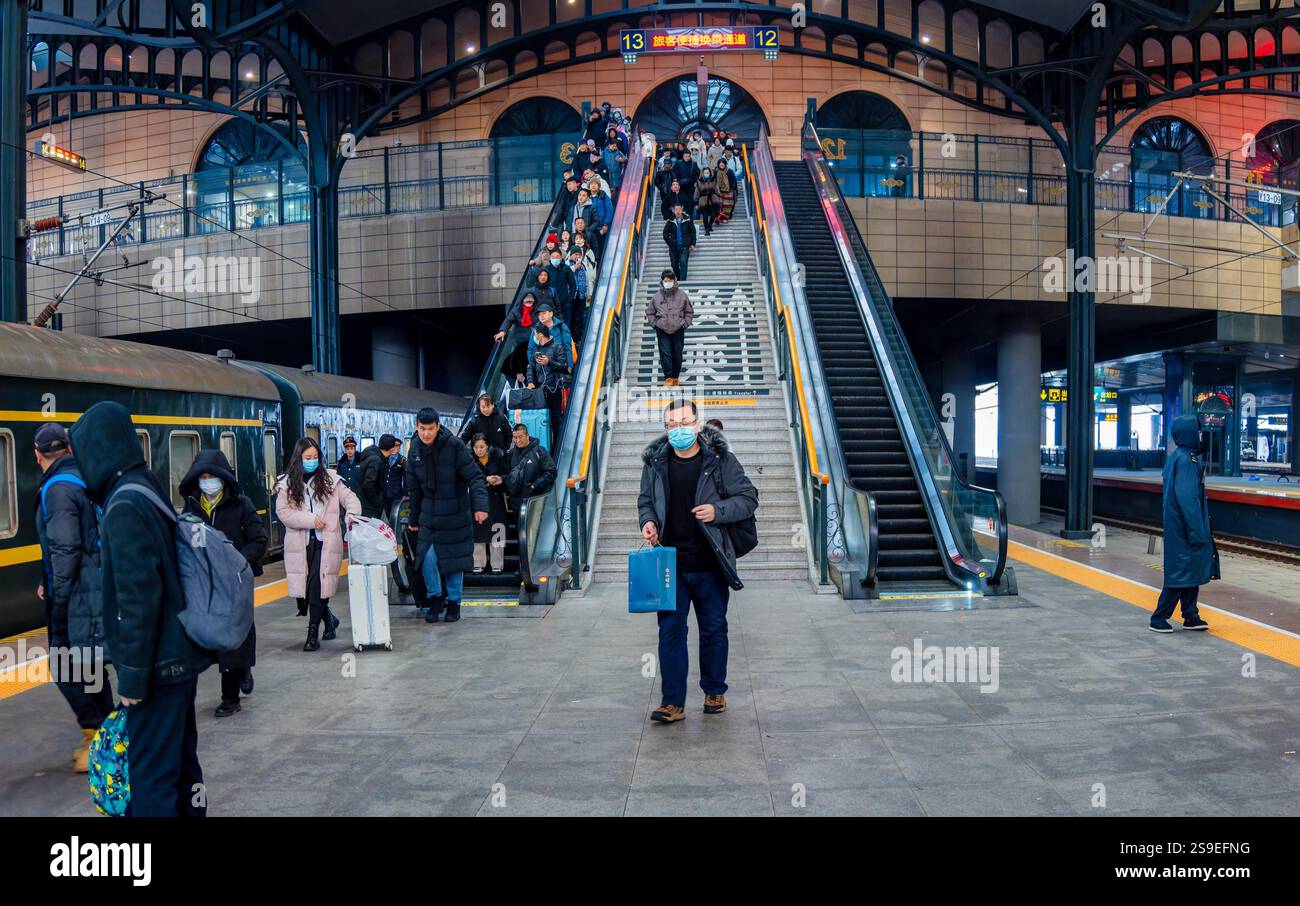 Passengers are seen at Harbin railway station in Harbin City, northeast ...