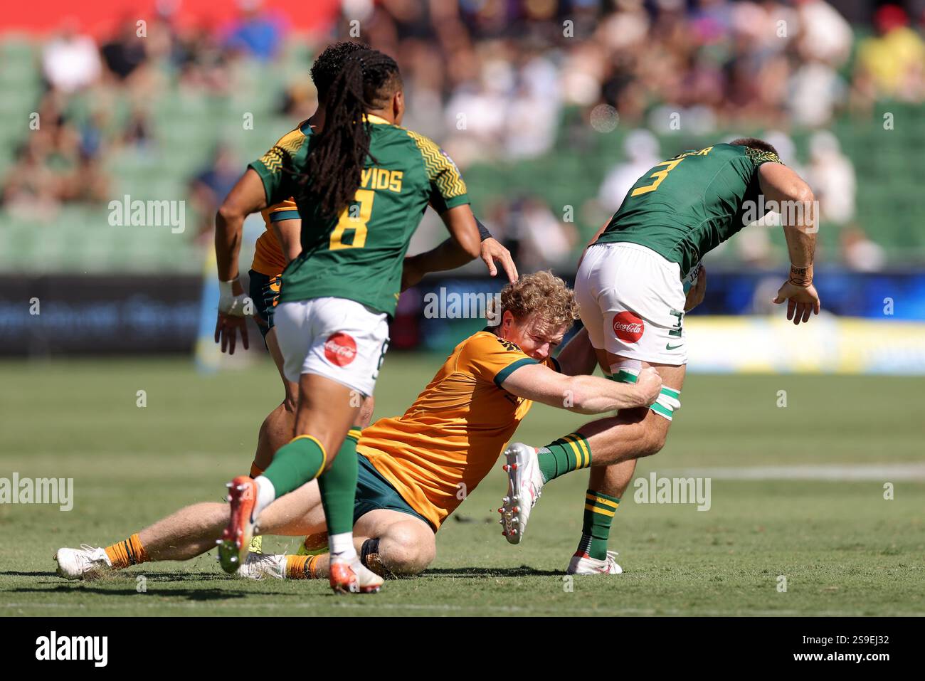 Perth, Australia. 26th Jan, 2025. Henry Hutchison of Australia tackles ...