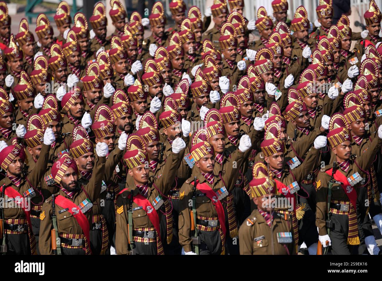 Indian defense forces march through the ceremonial Kartavya Path ...