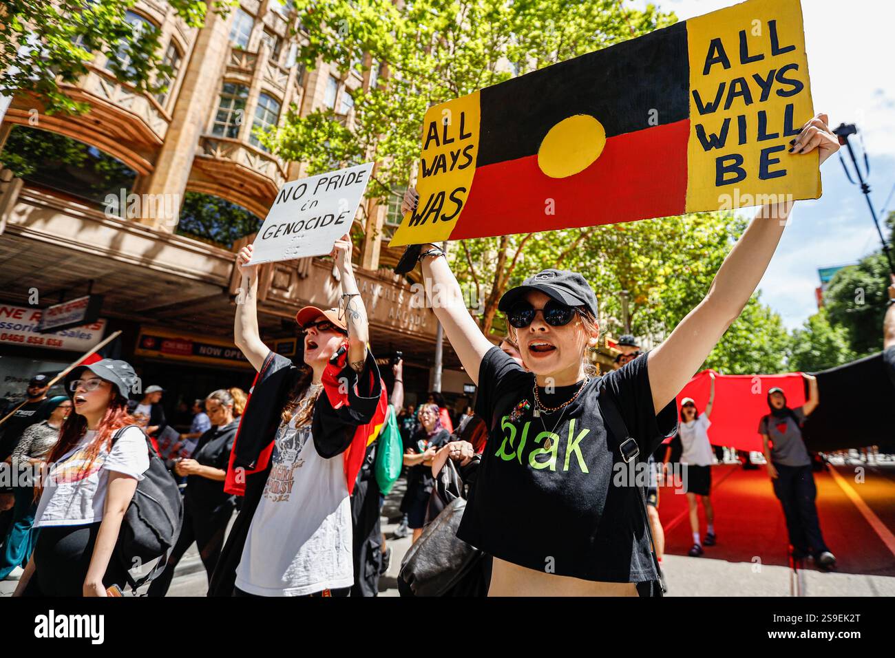 Melbourne, Australia. 26th Jan, 2025. Protesters chant slogans while ...