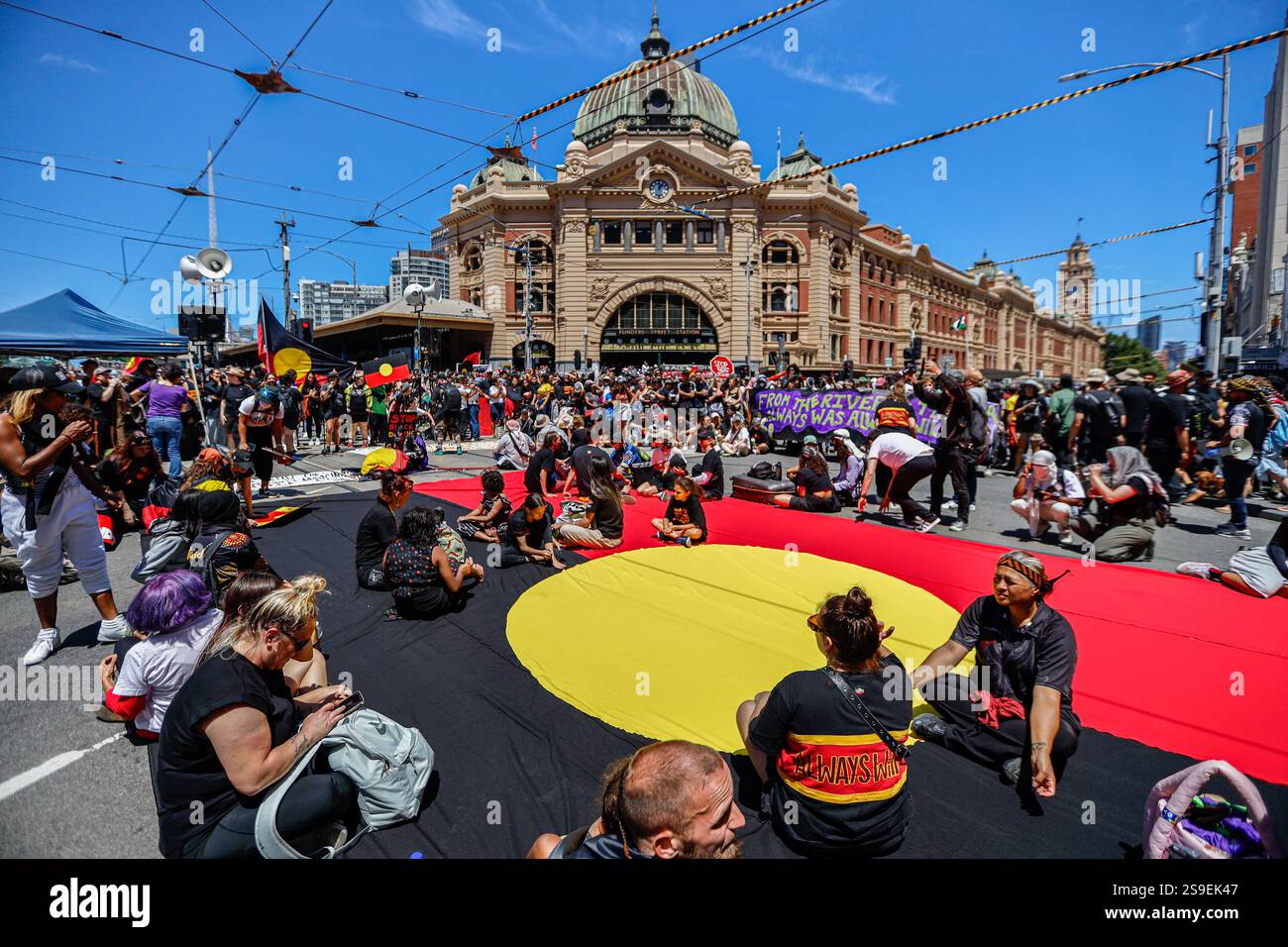 Crowd of protesters gather outside Flinders Street Station during the ...