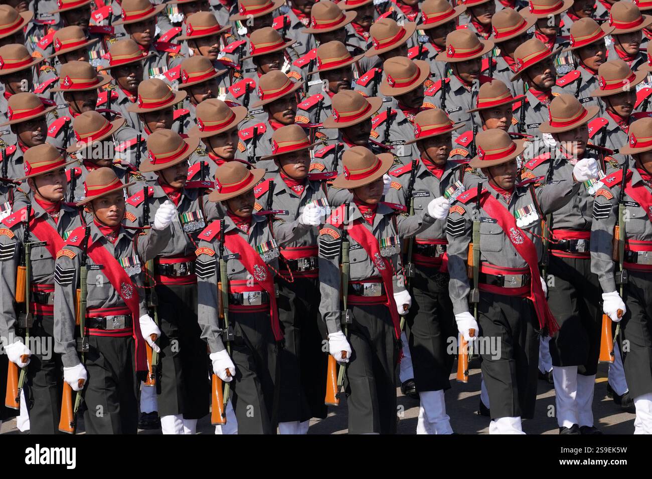 Indian defense forces march through the ceremonial Kartavya Path ...