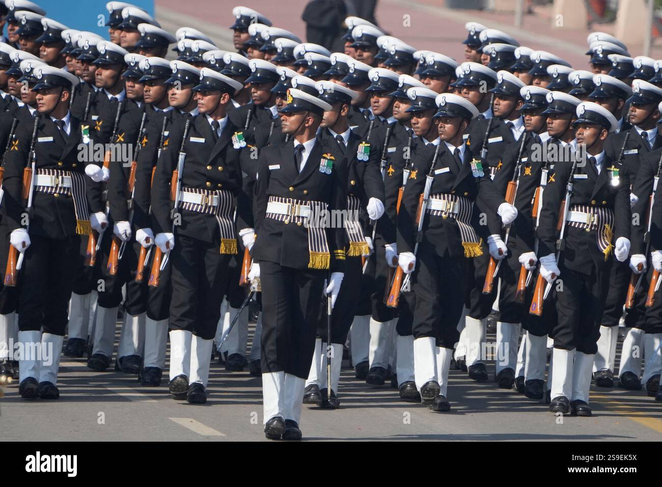 Indian defense forces march through the ceremonial Kartavya Path ...