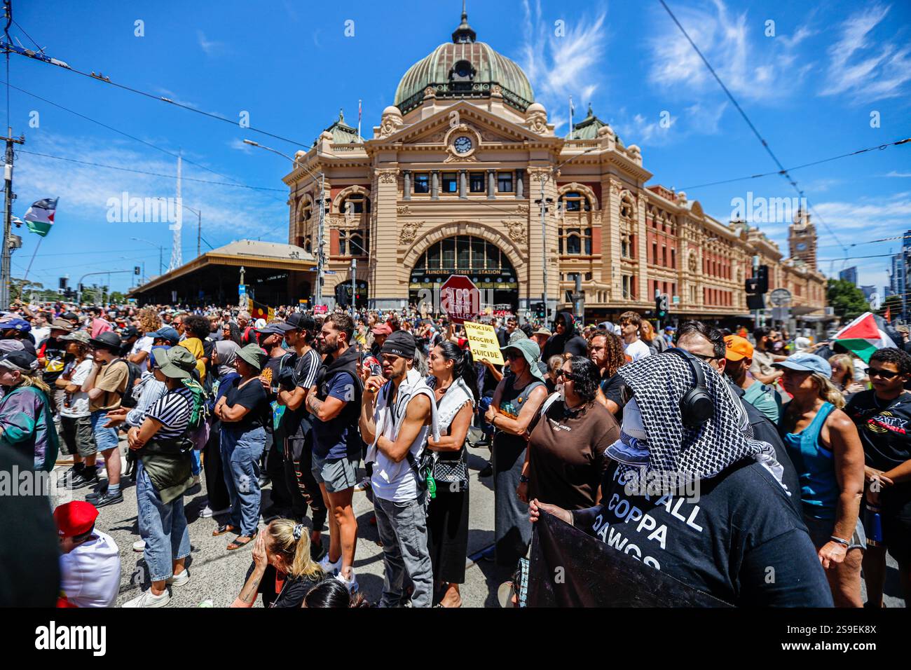 Crowd of protesters gather outside Flinders Street Station during the ...