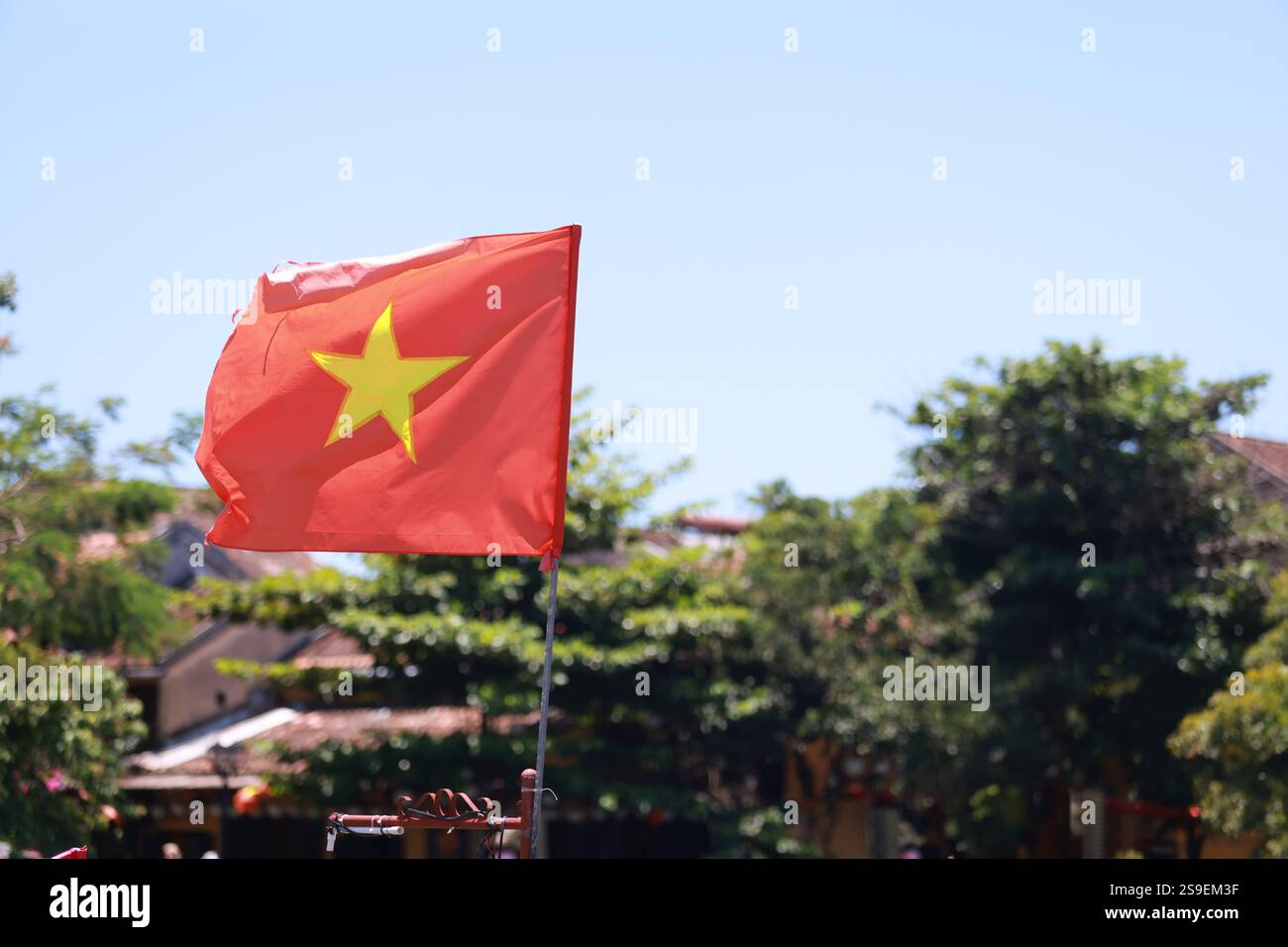 Vietnamese flag in the town of Hoi An Stock Photo - Alamy