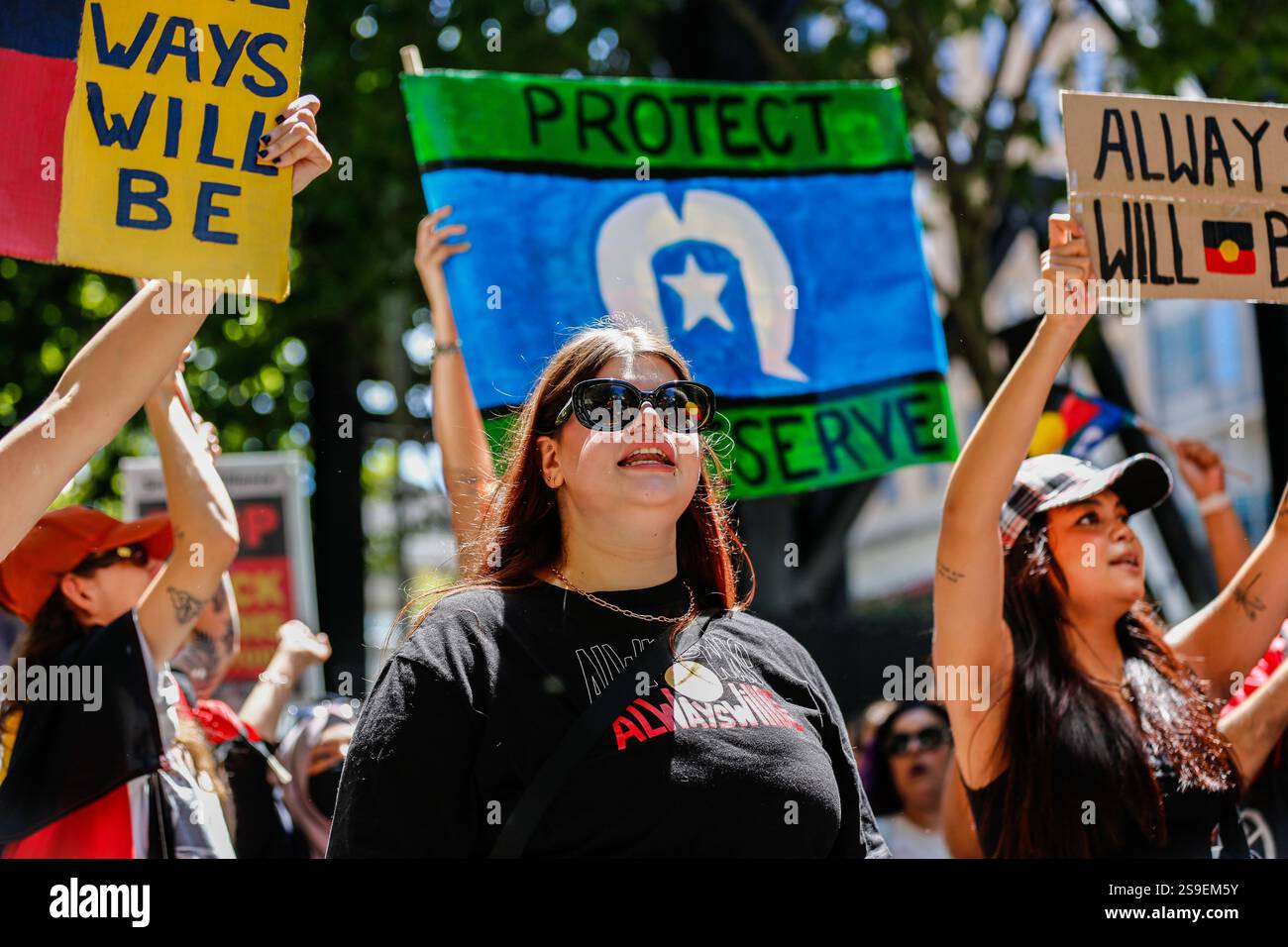 A young indigenous woman chants slogans during the annual Invasion Day ...