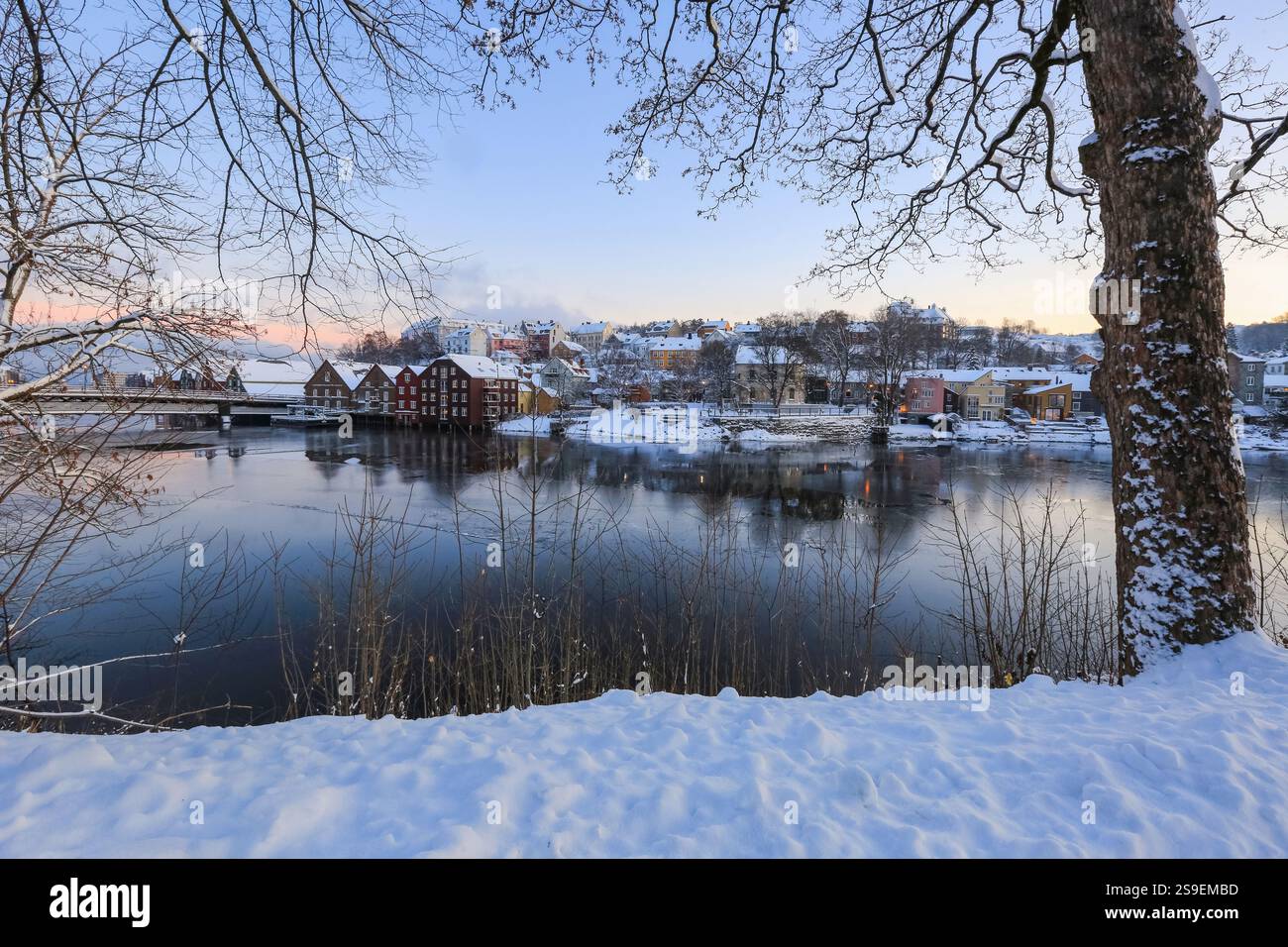 Winter in Trondheim, view of the river Nidelva, The Old Bridge and old ...