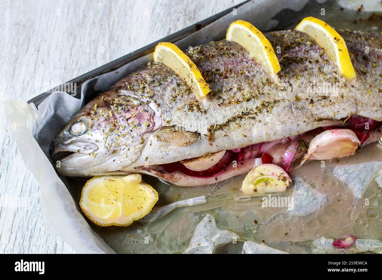 Baked rainbow trout with lemon. Healthy food Stock Photo - Alamy