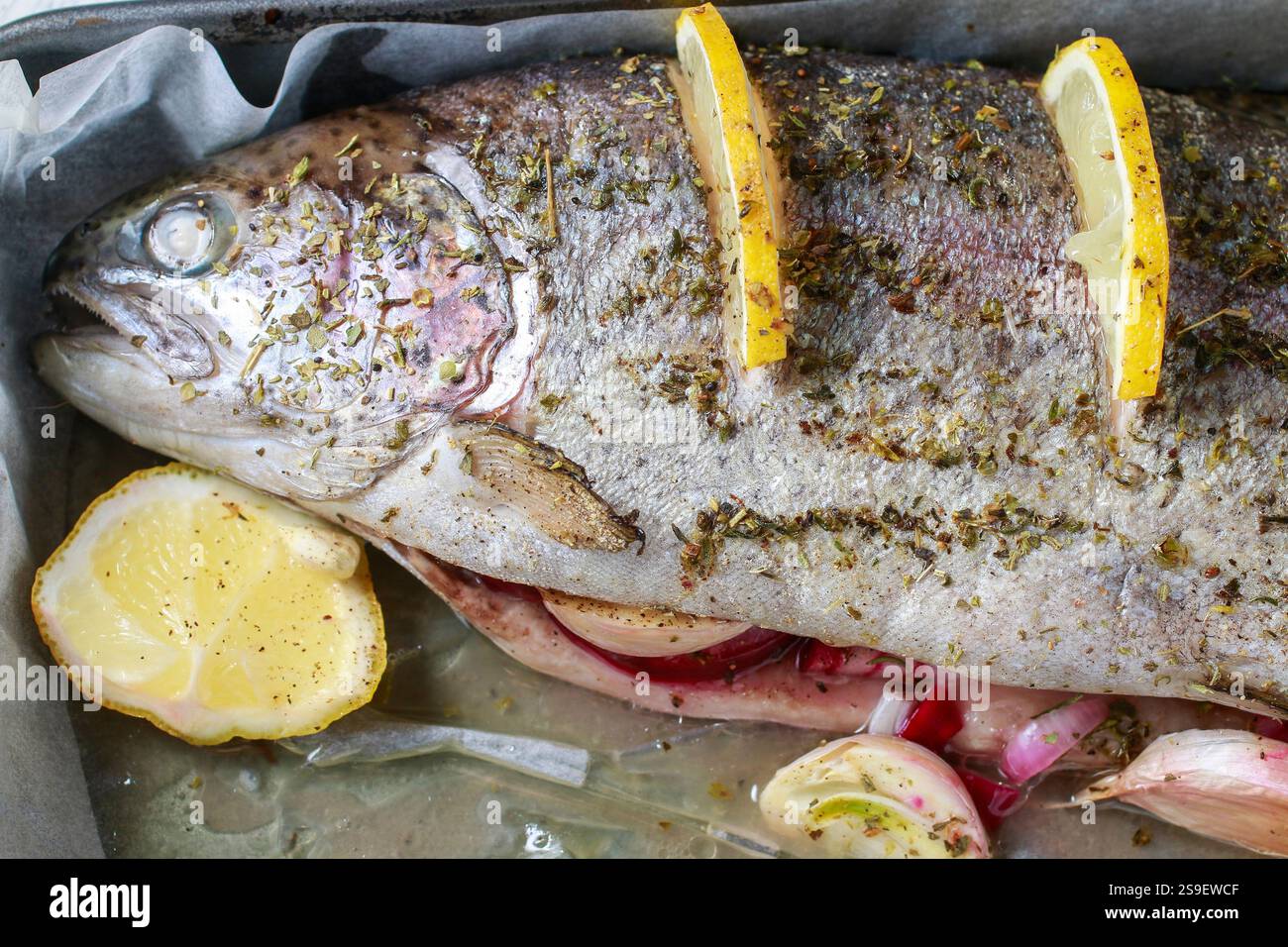 Baked rainbow trout with lemon. Healthy food Stock Photo - Alamy