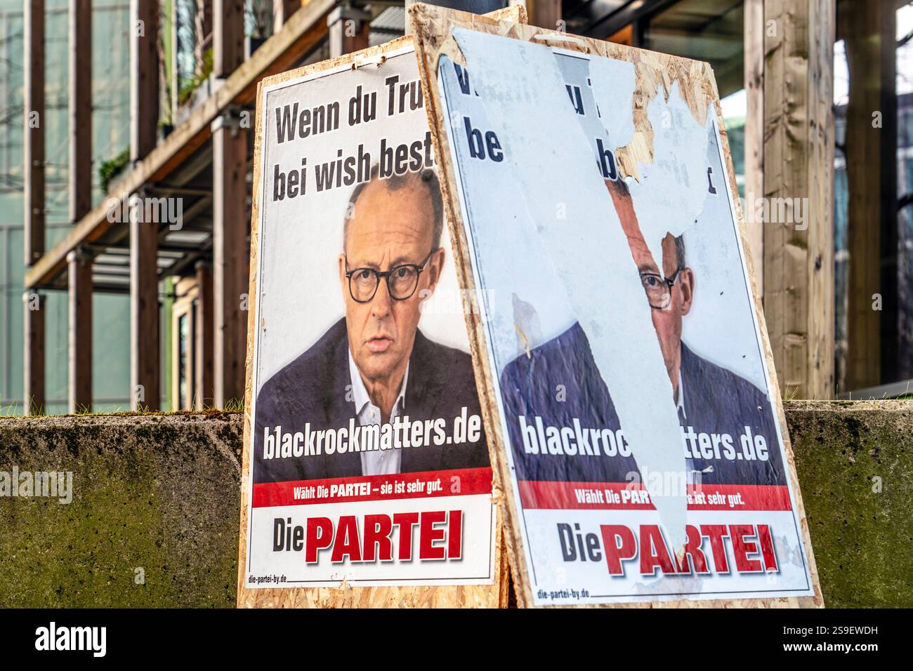 Beschädigte Wahlplakate der PARTEI mit Friedrich Merz vor der CSU ...