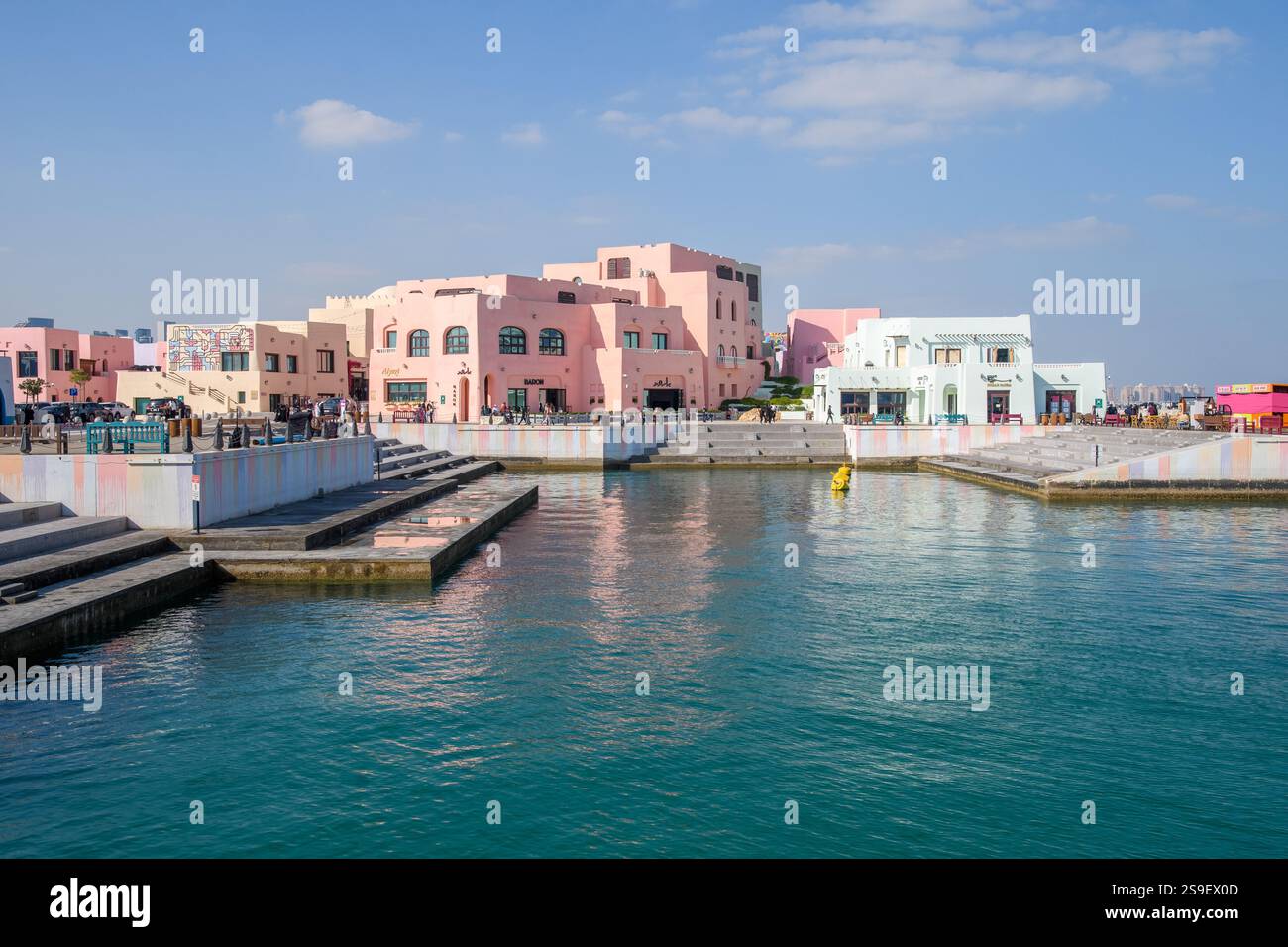 Doha, Qatar - January 4, 2025: The Mina District waterfront boasts ...