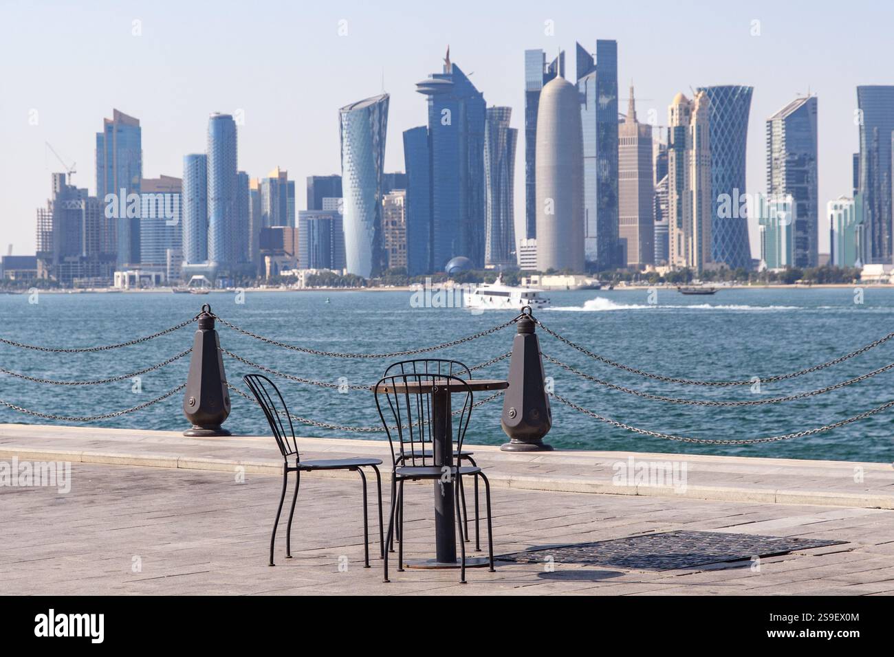 Doha, Qatar - January 4, 2025: A serene waterfront scene with empty ...