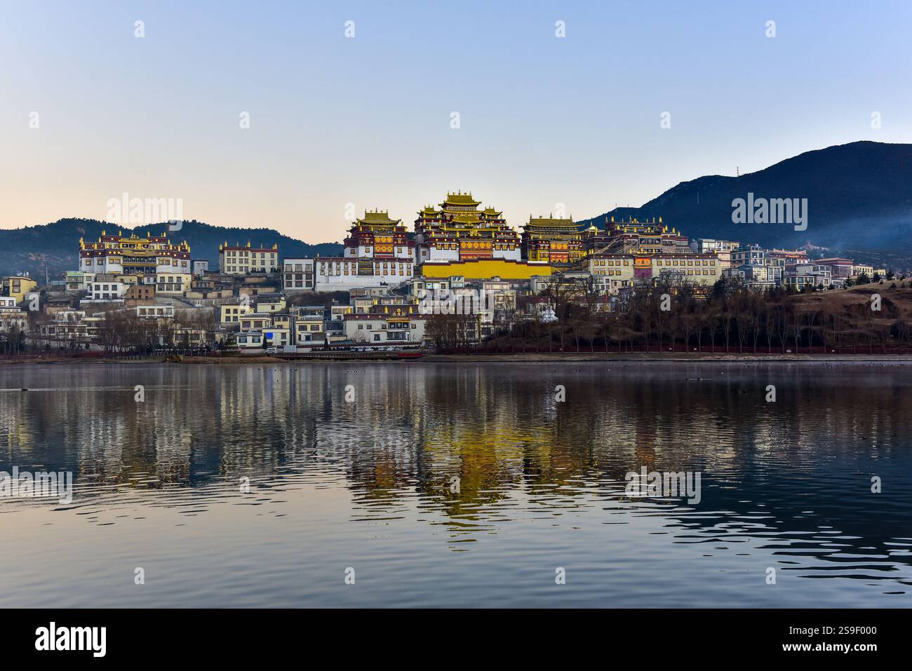 The Ganden Sumtseling Monestary and its reflection on Lamuyangcuo Lake ...