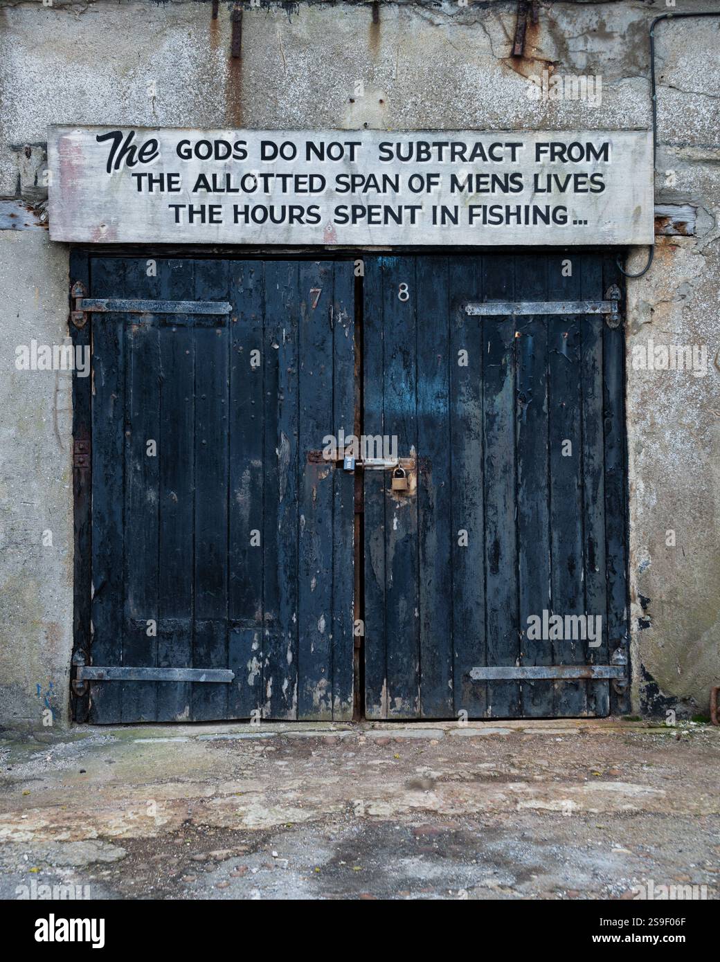 Image of old worn and weathered doors to fishing industry building in ...