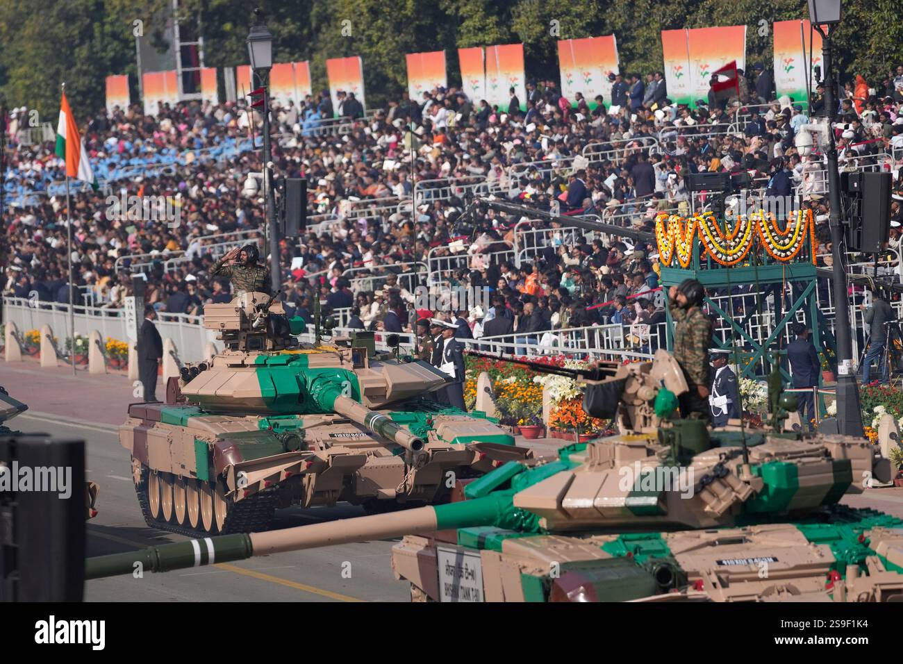 Indian defense forces march through the ceremonial Kartavya Path ...