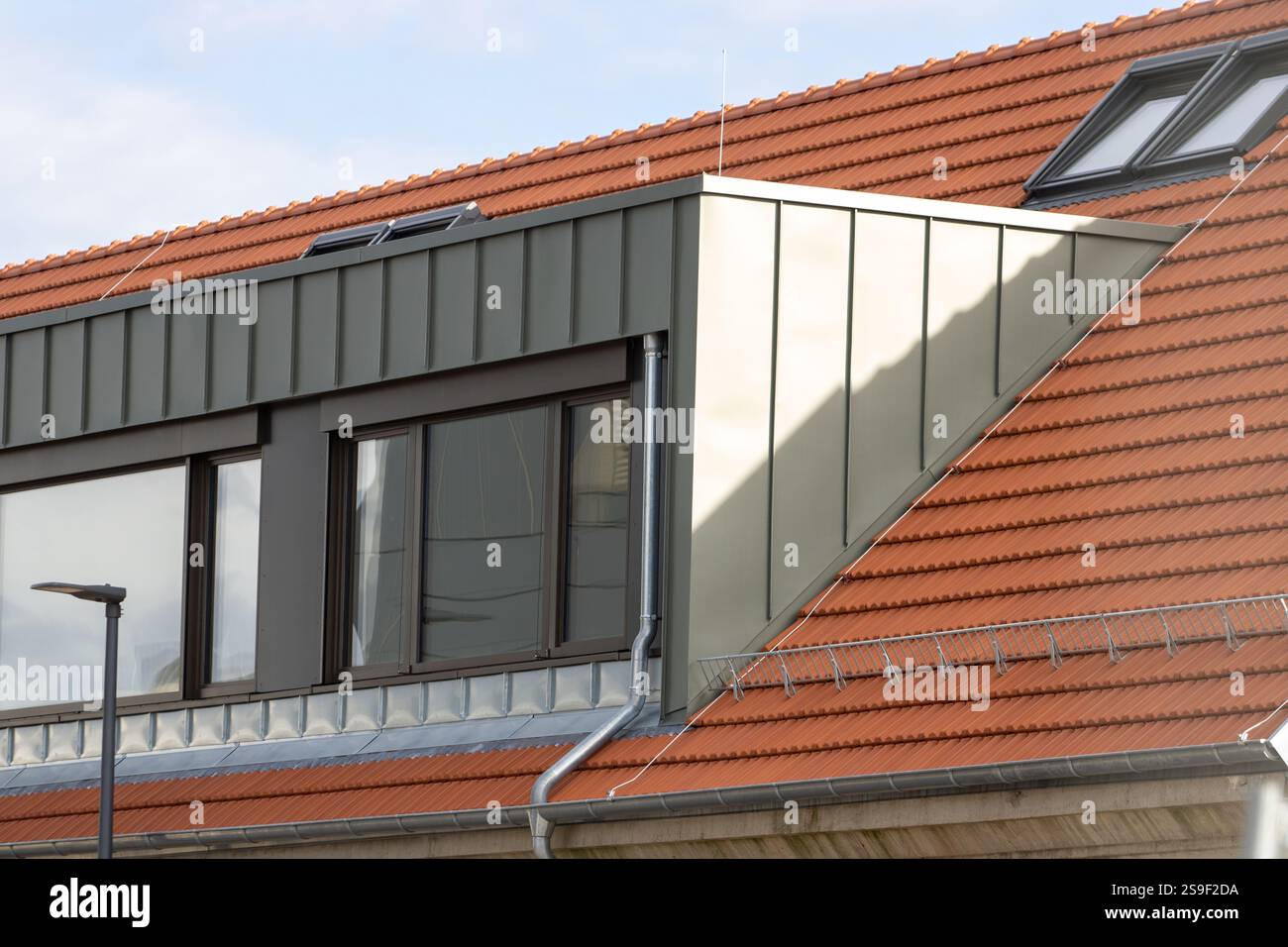 Large dormer window on a new tiled roof Stock Photo - Alamy