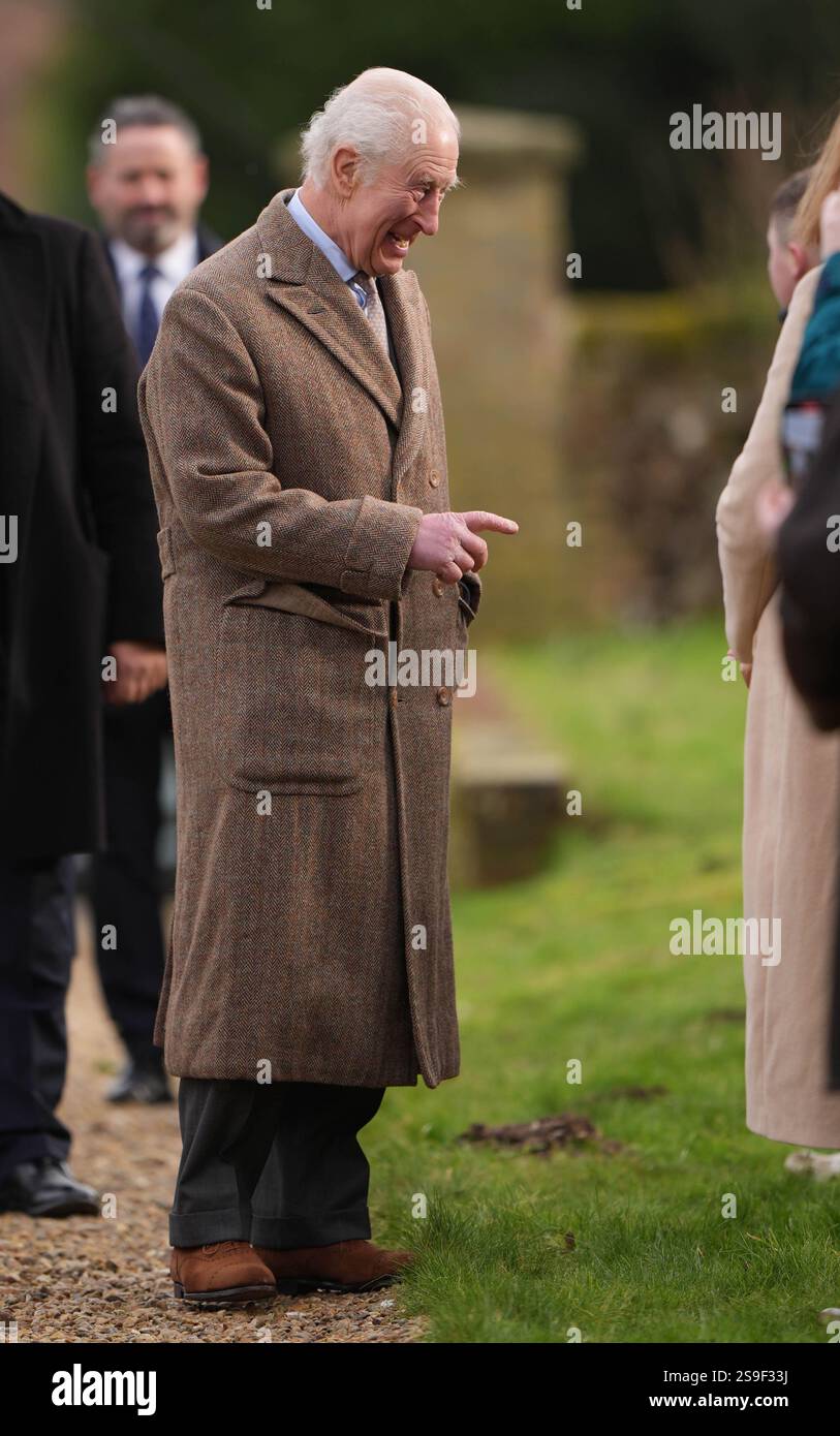 King Charles III speaks to members of the public as he arrives for a ...