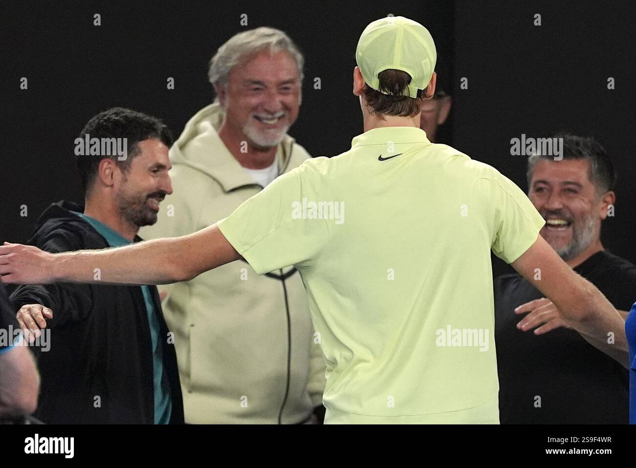 Jannik Sinner of Italy celebrates with his coaching team after ...