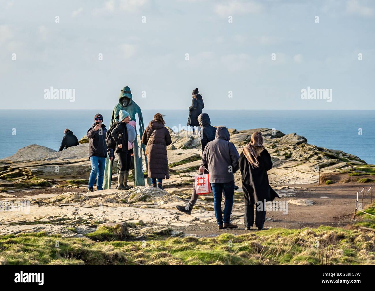 Tintagel, UK. 25 Jan 2025. Visitors at Tintagel Castle in Cornwall on a ...