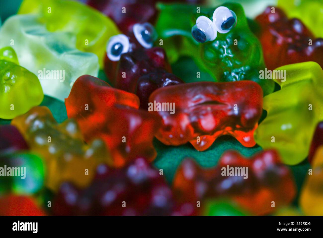 colorful gummy bears in a pile as a background Stock Photo - Alamy