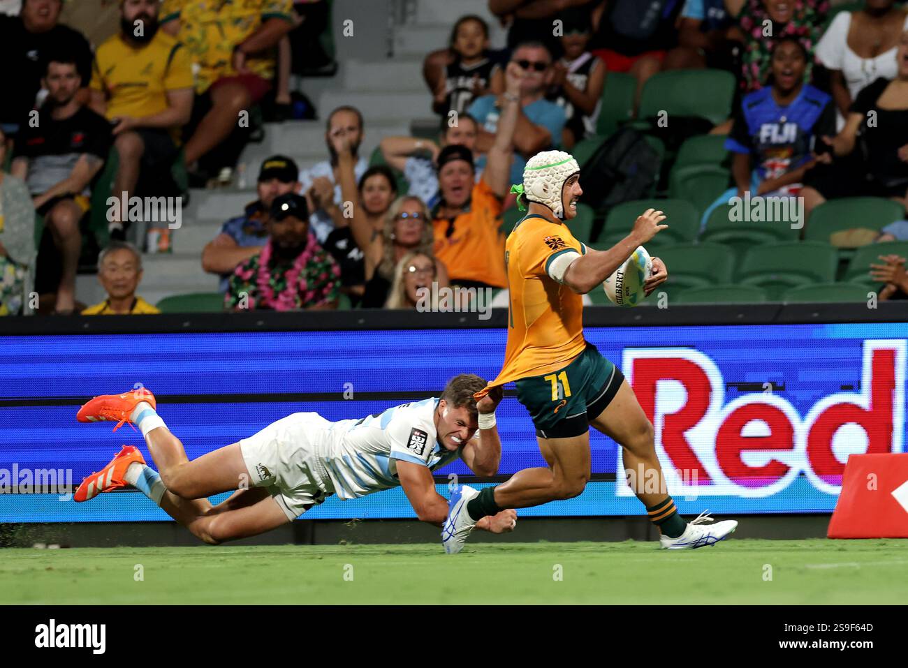 Perth, Australia. 26th Jan, 2025. Hadley Tonga of Australia runs in for ...