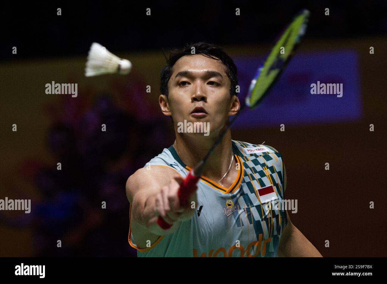 (250126) -- JAKARTA, Jan. 26, 2025 (Xinhua) -- Jonatan Christie hits a return during the men's ...