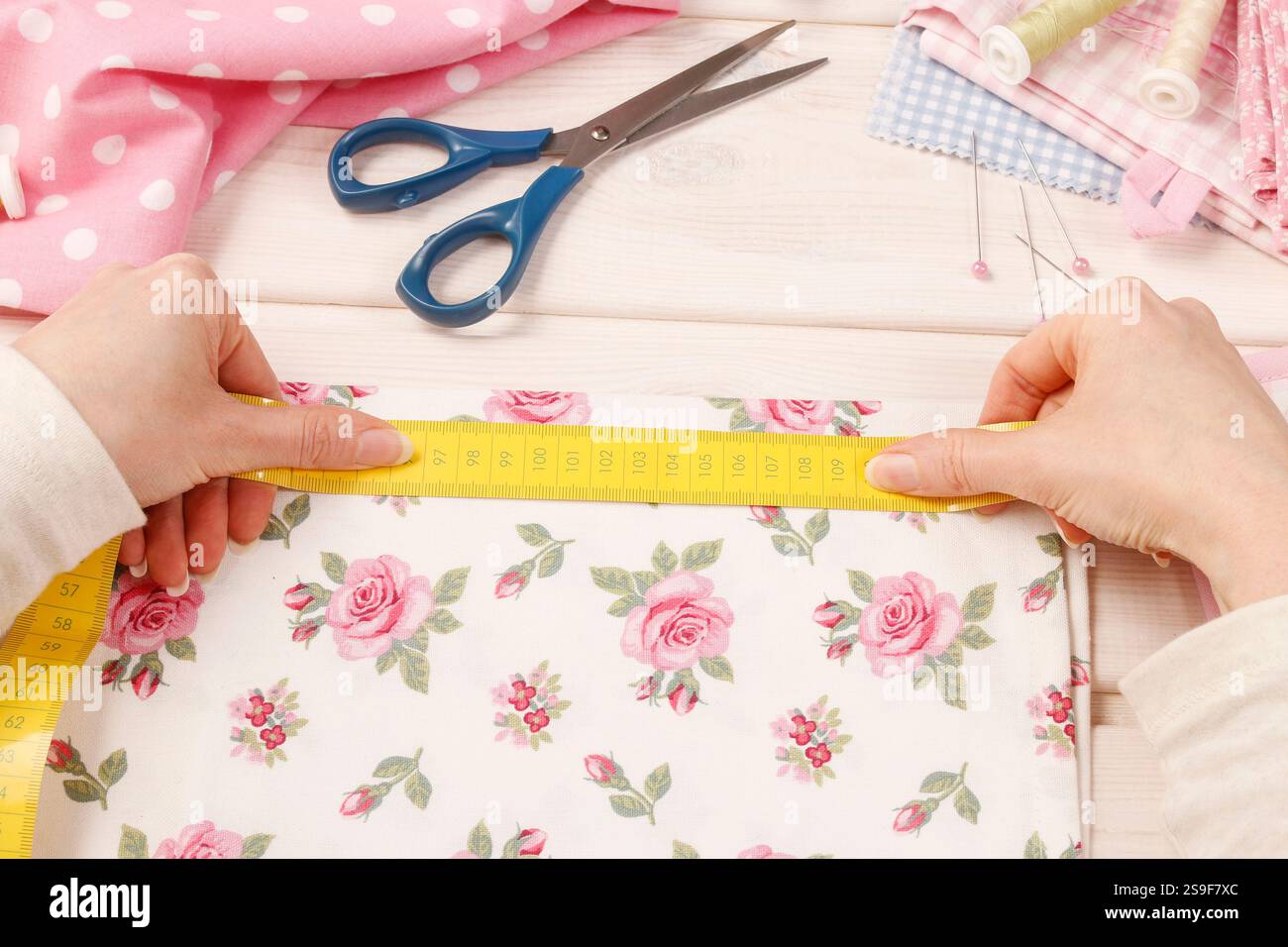 Sewing woman in work. Hobby time Stock Photo - Alamy