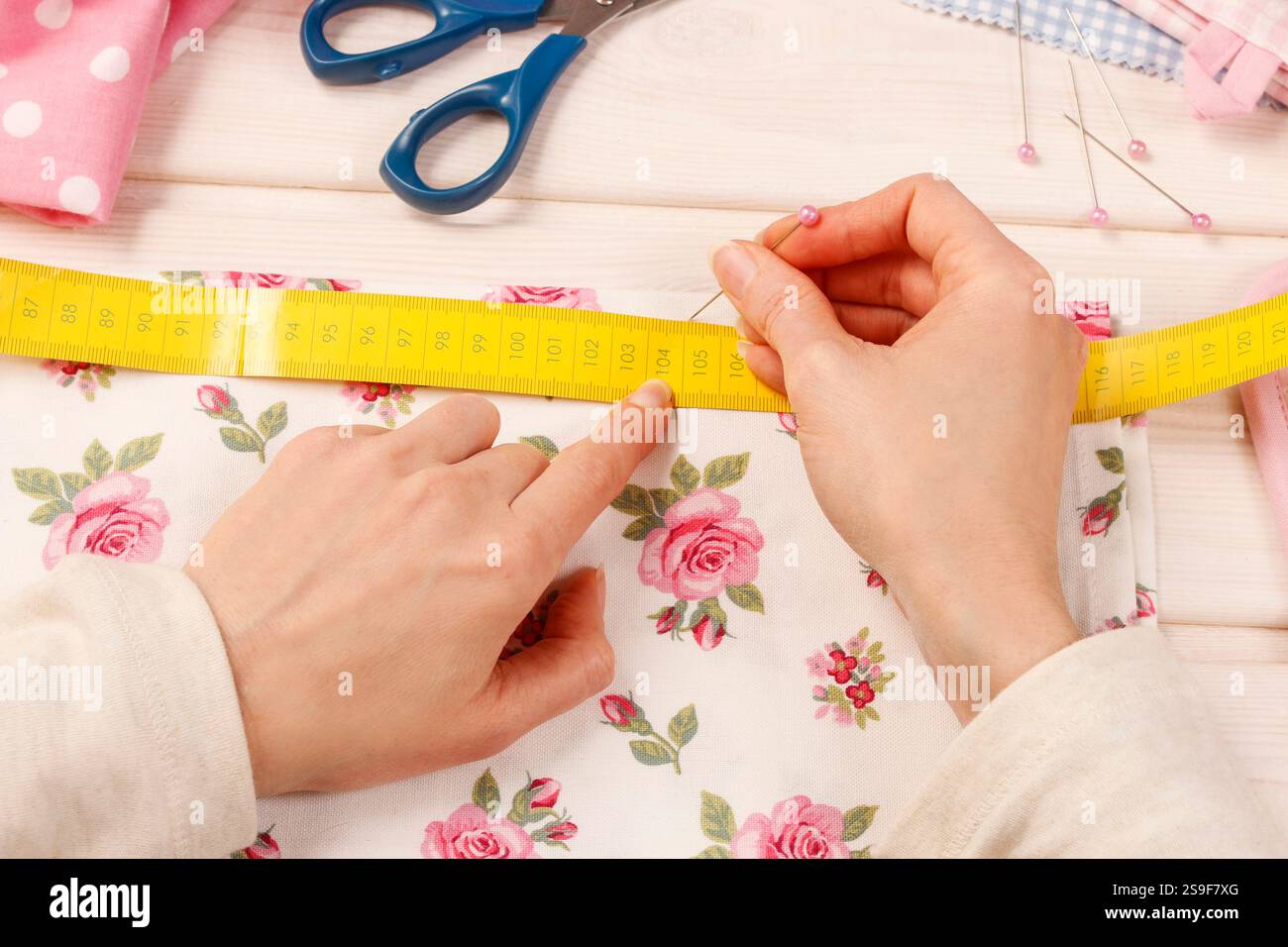 Sewing woman in work. Hobby time Stock Photo - Alamy