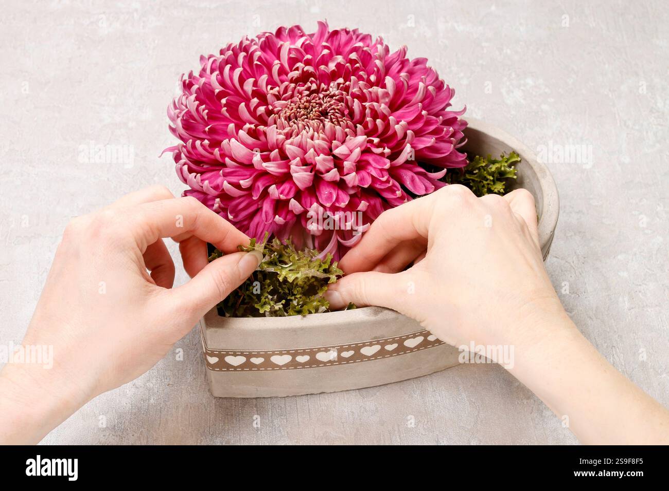 Florist at work: how to make simple floral arrangement with pink ...