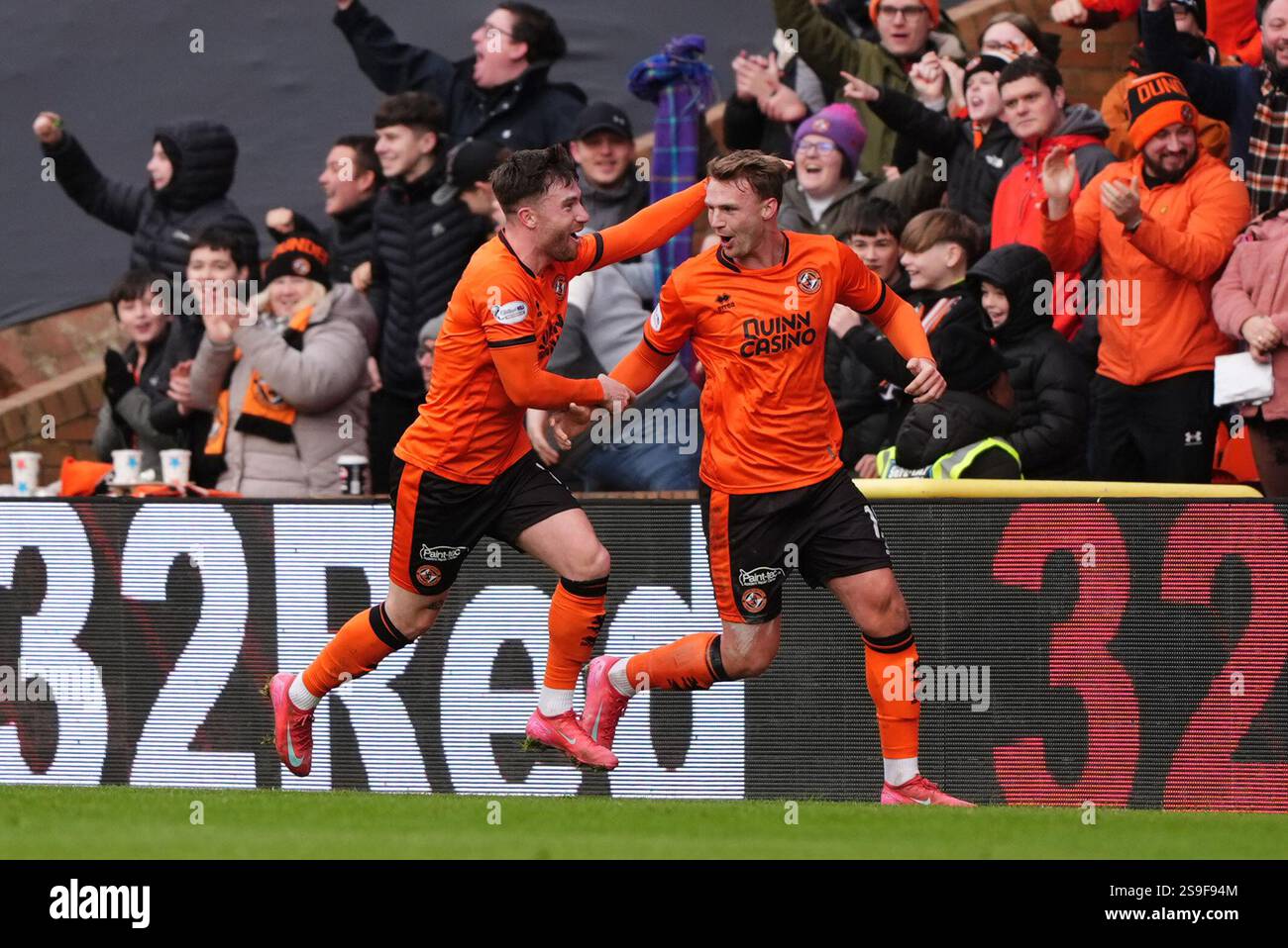 Dundee United's Sam Dalby (right) celebrates with Ryan Strain after ...
